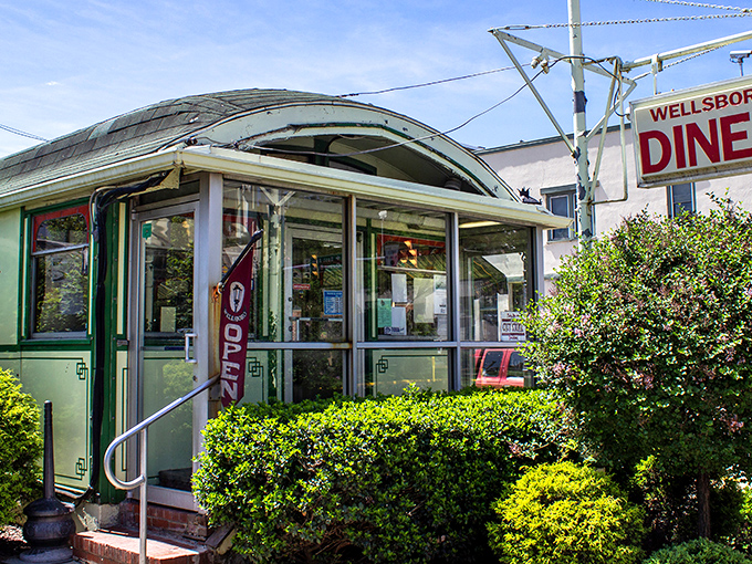 The gleaming stainless steel exterior of Wellsboro Diner isn't trying to be retro—it's the real deal, a genuine slice of Americana standing proudly on Main Street.