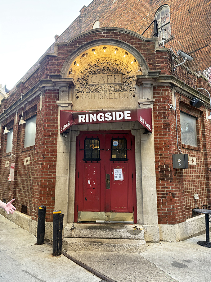 The historic brick façade of Ringside Café beckons with its distinctive red doors and vintage "RATHSKELLER" inscription—a Columbus landmark hiding culinary treasures within.