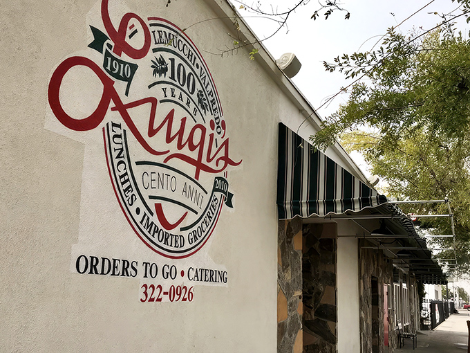 Luigi's classic storefront beckons with its vintage sign and green-striped awning—a time capsule of Italian-American tradition standing proudly in Bakersfield.