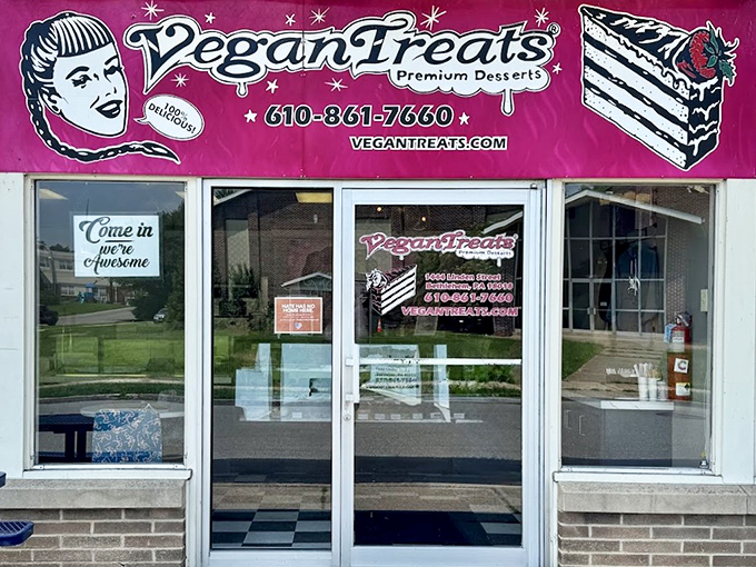The pink storefront of Vegan Treats beckons like a dessert oasis in Bethlehem. That retro signage isn't lying—premium desserts await inside.