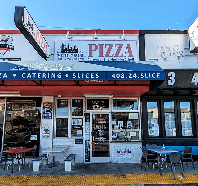 The unassuming storefront that houses pizza greatness. Like finding a Broadway star performing in your local coffee shop—unexpected but absolutely magical.