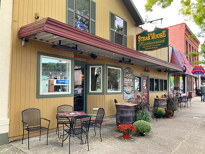 The quintessential small-town steakhouse experience awaits behind this charming yellow facade. Rustic barrels and sidewalk seating invite you to linger on Wellsboro's historic Main Street.