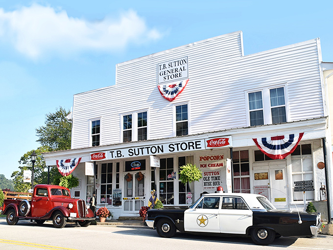 The T.B. Sutton General Store stands as a time capsule with its vintage vehicles parked out front – nostalgia you can actually touch and taste.