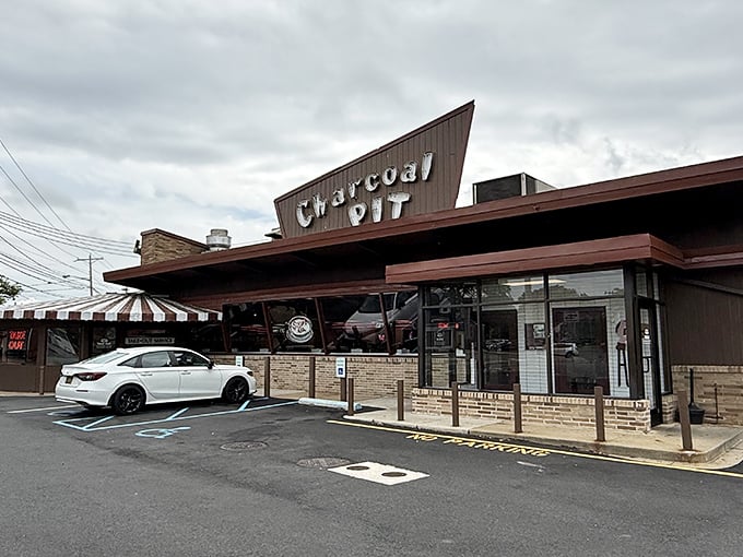 The iconic angular roof and vintage signage of Charcoal Pit stands as a beacon to burger lovers across Delaware. Time travel never tasted so good.