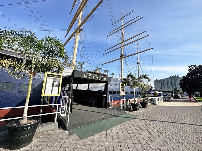 A maritime adventure awaits at Moshulu's gangplank, where towering masts and palm trees create an unexpected tropical-meets-nautical welcome on Philadelphia's waterfront.