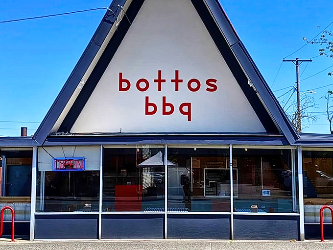 The iconic A-frame of Botto's BBQ stands like a beacon of smoky promise against the Portland sky. Simple, unpretentious, and absolutely magnetic to meat lovers.