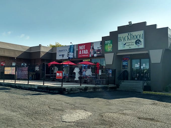 The exterior promises good times with those cheerful umbrellas – like a backyard BBQ that got its own building.