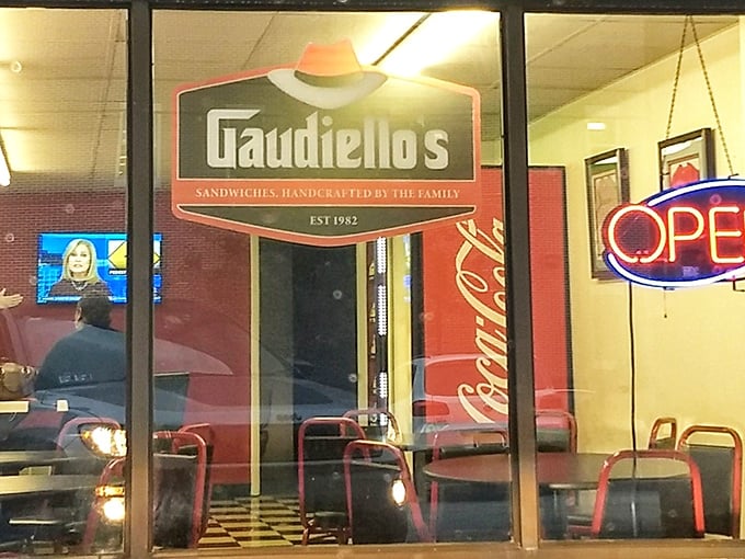 Don't let the modest storefront fool you – beneath that sign lies a sandwich paradise that's worth every mile of your journey.