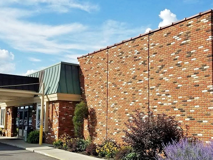 The unassuming brick exterior of Plaza Inn in Mt. Victory might not scream "culinary destination," but locals know better—this is comfort food headquarters.