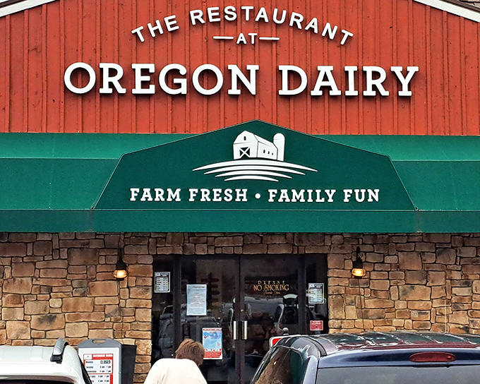 The iconic red barn exterior of Oregon Dairy Restaurant promises farm-fresh delights within those stone walls. Like a culinary lighthouse beckoning hungry travelers home.