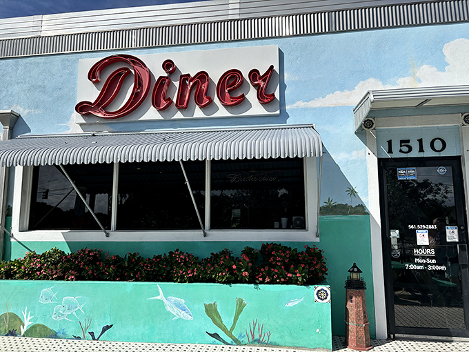 That turquoise exterior isn't just pretty – it's practically broadcasting "amazing comfort food lives here, folks!"