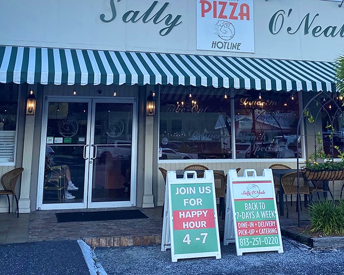 The iconic green and white striped awning of Sally O'Neal's beckons like an old friend, promising Italian comfort in the heart of Tampa.