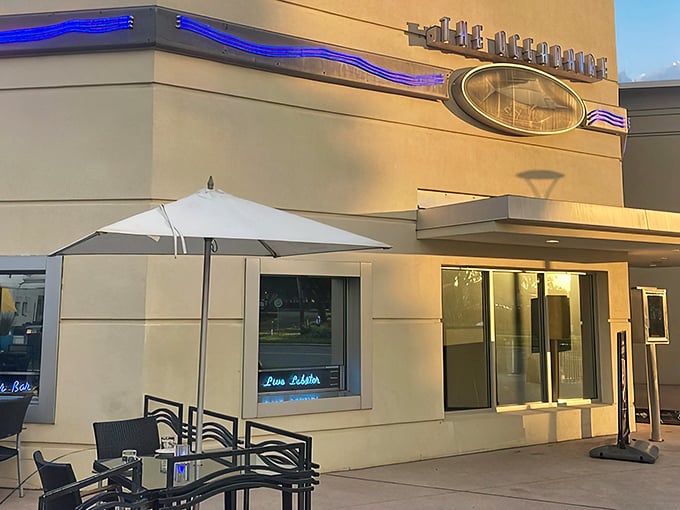 The blue glow of The Oceanaire's iconic sign promises maritime delights within—like a lighthouse guiding hungry sailors to culinary treasure.