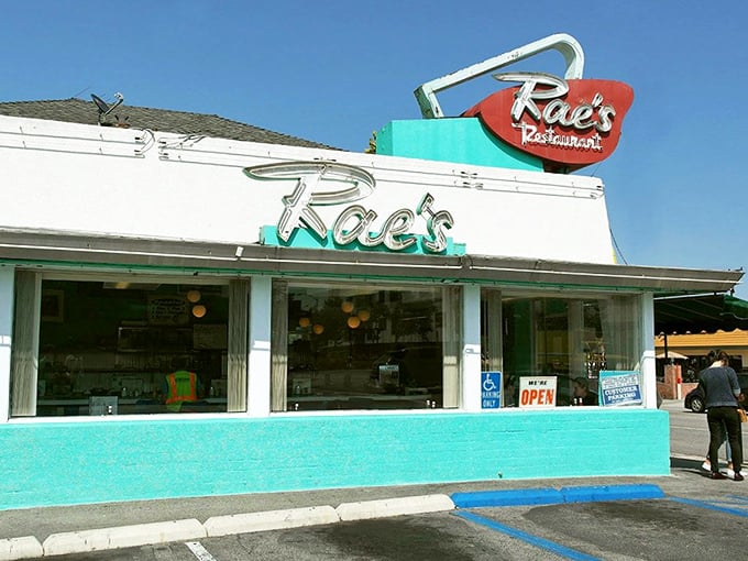 That turquoise and white facade might look humble, but inside lies breakfast magic waiting to happen.