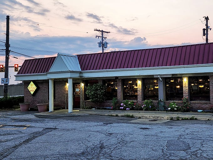 The classic American diner dream – red countertops, green vinyl stools, and conversations that flow as freely as the coffee refills.