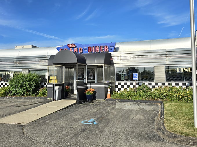 The classic stainless steel exterior with bold blue signage isn't trying to be retro—it's authentically timeless, like comfort food in architectural form.