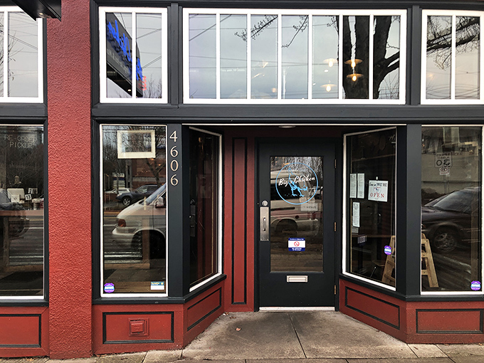 The vibrant red exterior with bright orange umbrellas isn't just inviting—it's practically shouting "your diet starts tomorrow!" Classic Portland charm meets Southern hospitality.