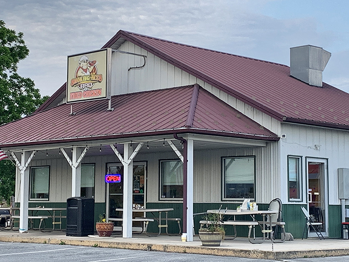 The unassuming exterior of Smoking Aces BBQ promises little but delivers big—a classic case of "don't judge a barbecue joint by its metal roof."