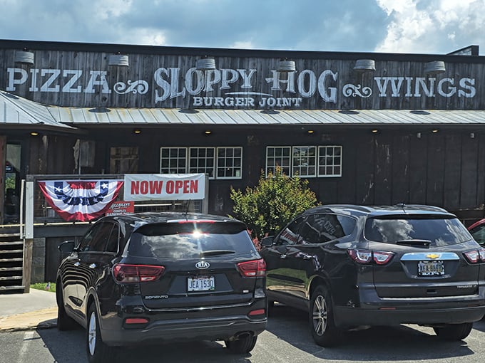 The rustic wooden facade of Sloppy Hog Burger Joint promises exactly what Tennessee comfort food should be—unpretentious, hearty, and absolutely worth the drive.