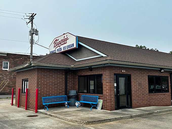 The sign says it all: donuts, pizza, and ice cream. It's like they read my diary and built a business around it.