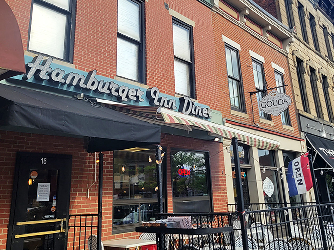 The iconic blue lettering of Hamburger Inn Diner beckons from downtown Delaware like a neon-lit time machine to simpler, more delicious times.