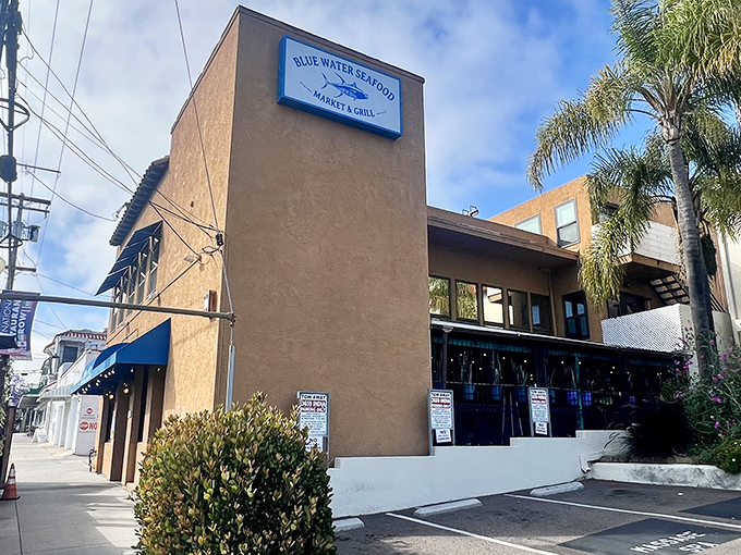 The unassuming exterior of Blue Water Seafood hides culinary treasures within. Like finding a pearl in an oyster, this modest storefront delivers oceanic delights beyond its simple façade.