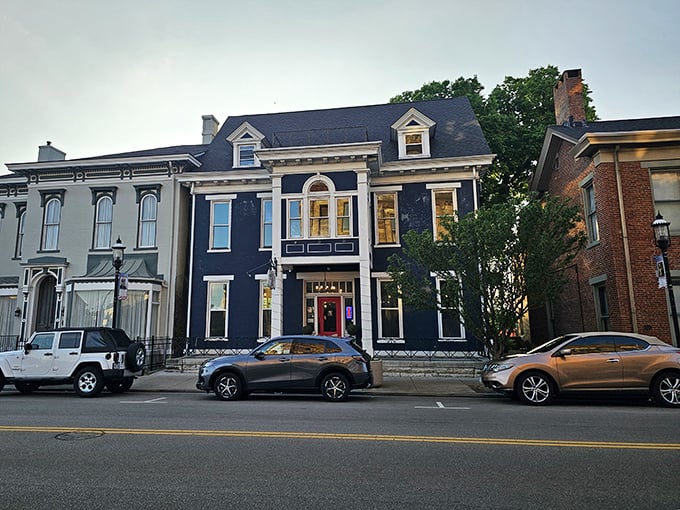 The stately navy blue Victorian facade of The Swire Inn stands proudly on Middletown's Main Street, a culinary beacon in historic architecture.