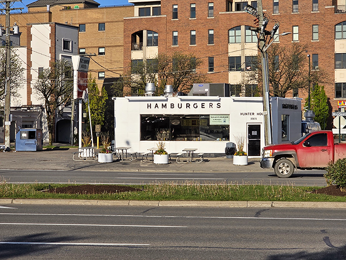 The unassuming white exterior of Hunter House stands like a time capsule amid Birmingham's upscale surroundings—proof that culinary treasures often hide in plain sight.
