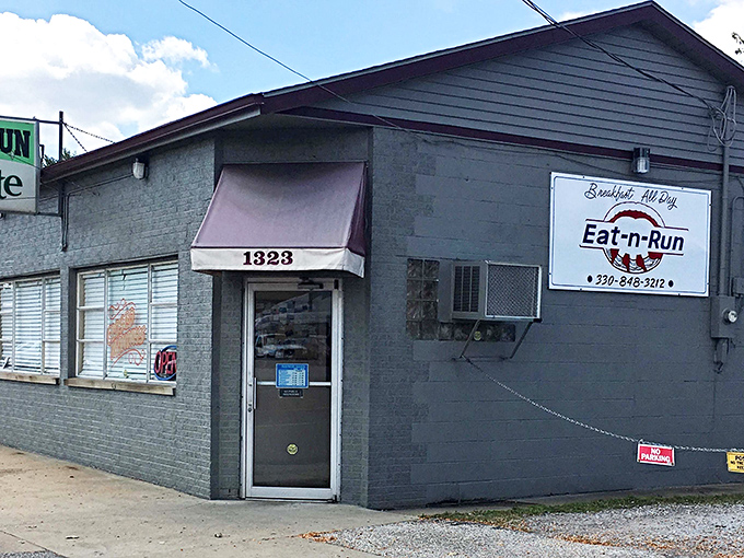 The unassuming exterior of Eat-N-Run might not win architectural awards, but that vintage Sprite sign promises something timeless waiting inside. Culinary treasures often hide in plain sight.