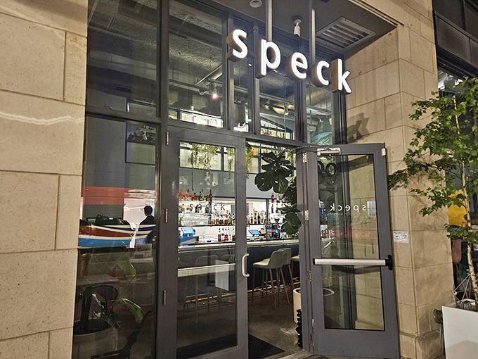 Speck's understated entrance belies the culinary magic happening inside. Like finding a secret doorway to flavor paradise in downtown Columbus.