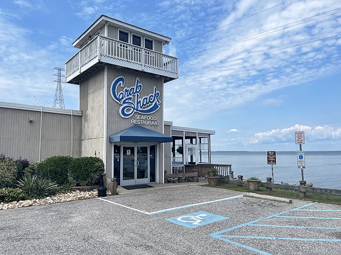 The watchtower-like structure isn't just for show—it's your lighthouse to seafood nirvana, perched right on the James River with views that rival the food.
