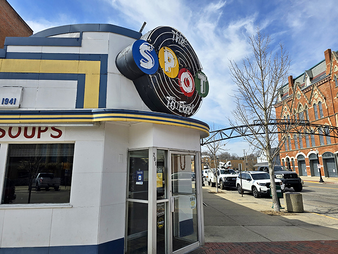 The iconic circular "SPOT" sign has been guiding hungry travelers to this Sidney landmark for generations, a beacon of comfort food in a sea of chain restaurants.