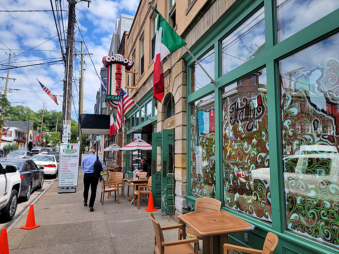 The iconic yellow brick and green trim of Corbo's Bakery stands as a beacon of sweetness in Cleveland's Little Italy neighborhood.
