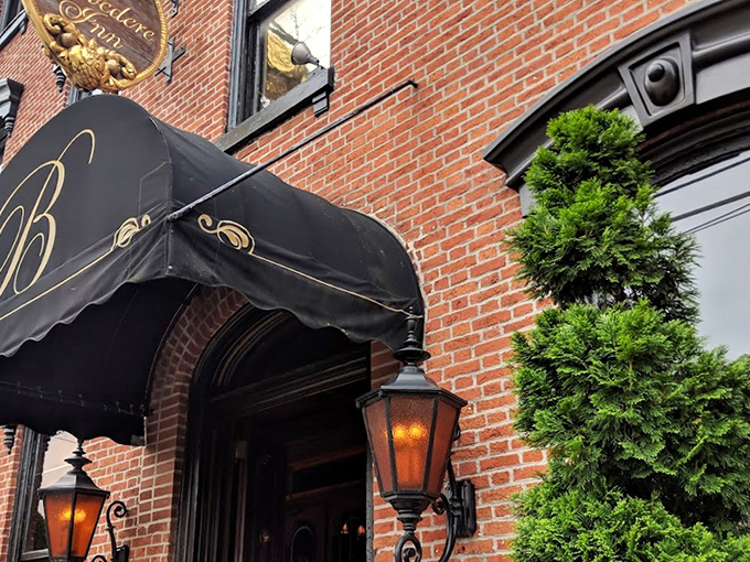 The elegant Victorian façade of The Belvedere Inn welcomes you with its signature black awning and seasonal flowers—Lancaster's version of a warm embrace.
