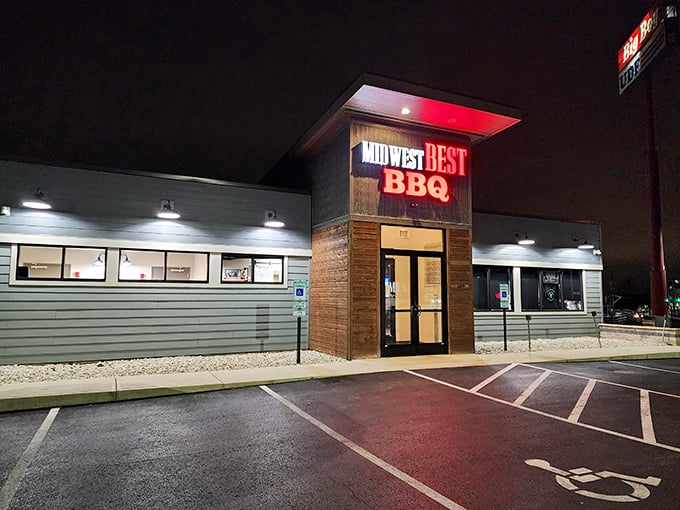 The modern rustic exterior of Midwest Best BBQ beckons like a beacon of smoky promise in Loveland. Those red letters might as well say "salvation" for hungry travelers.