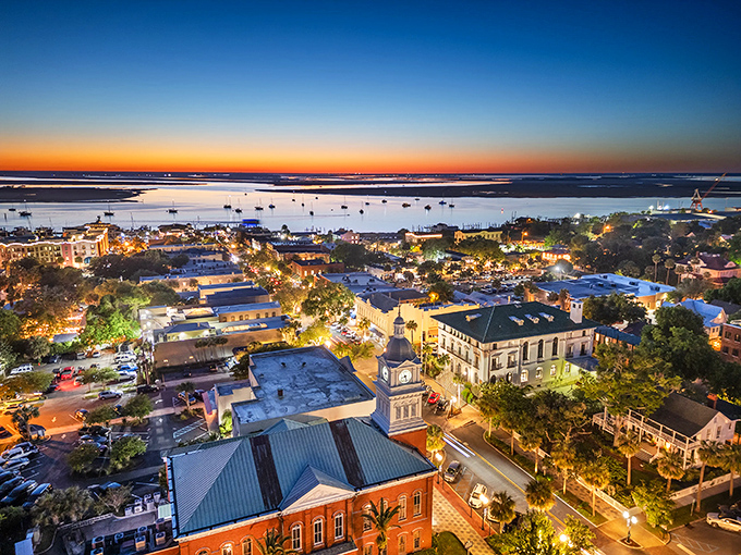 Twilight magic transforms Fernandina Beach into a glowing jewel where Victorian architecture meets coastal tranquility. The kind of view that makes you forget your phone password.