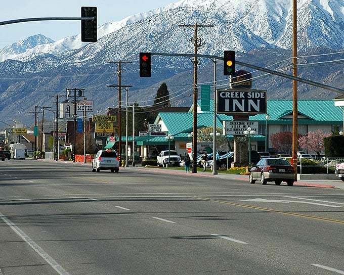 Bishop greets you with that perfect small-town charm, where snow-capped Sierra peaks stand guard like nature's skyscrapers.