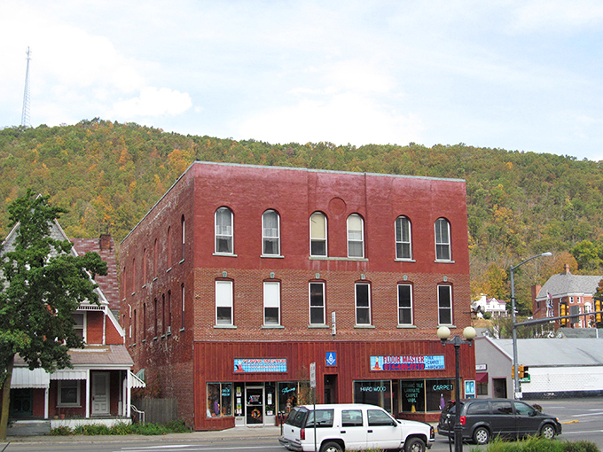 Fourth Street stretches before you like a Norman Rockwell painting come to life, where traffic lights are merely suggestions and mountain views come standard with every visit.