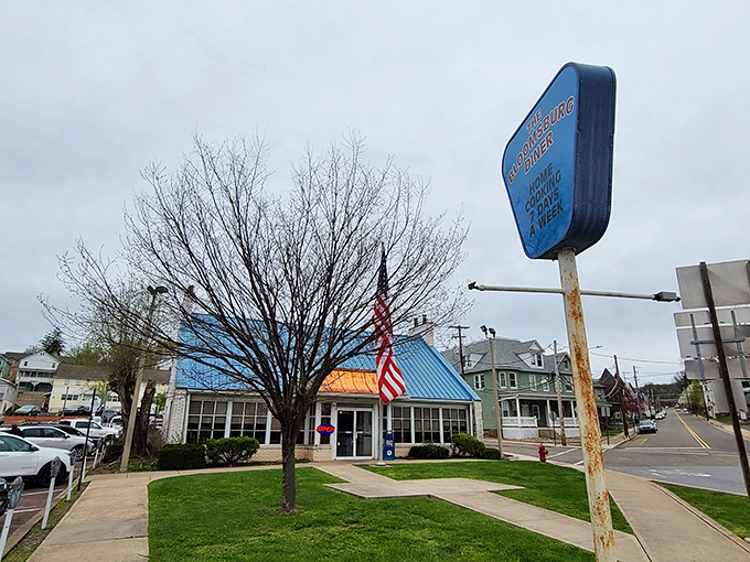 The blue-roofed beacon of breakfast hope stands proudly on Bloomsburg's street corner, promising comfort food salvation to hungry travelers and locals alike.