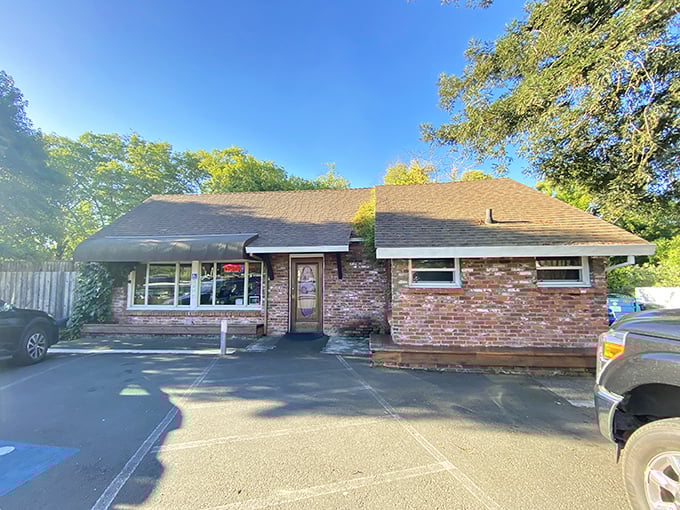 The unassuming brick exterior of Hank's Creekside might not scream "culinary destination," but locals know better. Breakfast paradise awaits behind that modest door.