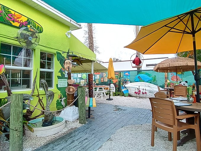 The lime-green cottage with giant silverware and tropical flair isn't just eye-catching—it's practically screaming "amazing brunch inside!" at passing motorists on Gulf Boulevard.