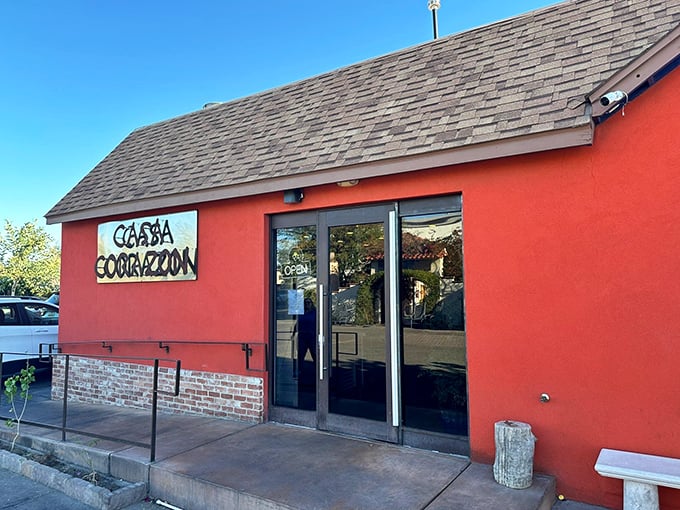 The coral-red exterior of Casa Corazón stands out like a delicious beacon in Phoenix, promising authentic flavors before you even step inside.