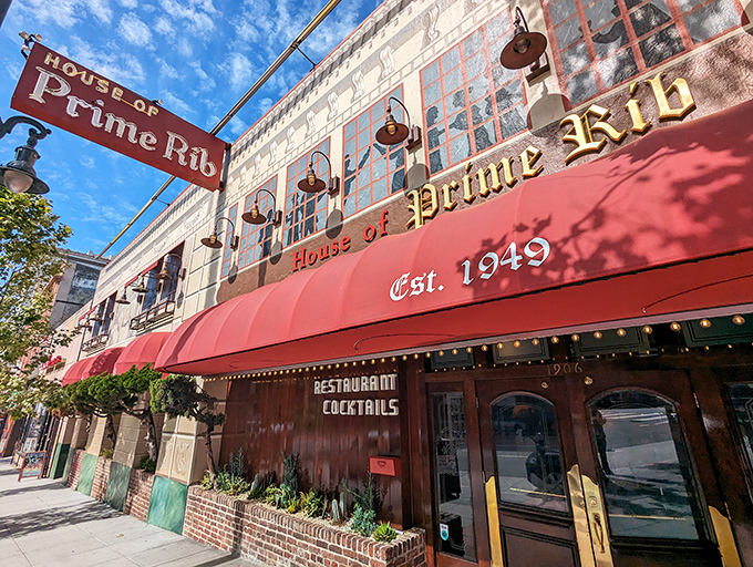 That burgundy awning beckons like a beacon for beef lovers seeking San Francisco's most legendary prime rib experience.