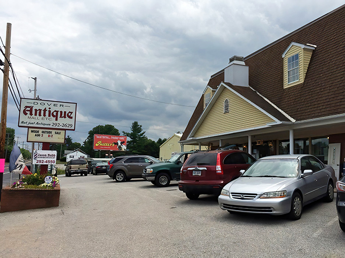 The colonial-style exterior of Dover Antique Mall beckons treasure hunters with its dormer windows and welcoming porch—architectural foreplay for the vintage delights within.