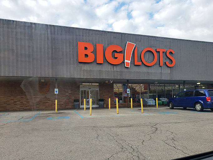 The iconic orange Big Lots sign stands proud against a blue Ohio sky, beckoning bargain hunters like a retail lighthouse guiding ships to shore.