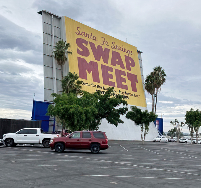 The iconic yellow and purple sign welcomes bargain hunters with a simple promise: "Come for the bargains. Stay for the fun."