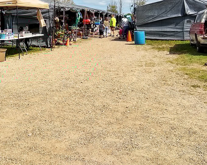 The entrance to treasure-hunting paradise. Gravel pathways lead to canopied stalls where one person's castoffs become another's must-haves.