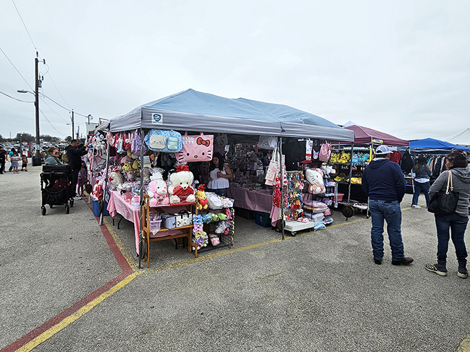 Blue tents stretch across the horizon like a bargain hunter's mirage, with plush toys and colorful trinkets beckoning shoppers to explore further.