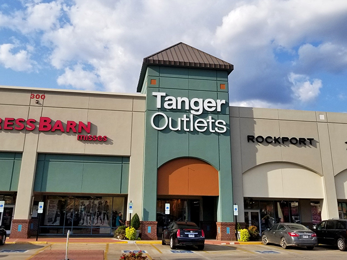 The iconic teal towers of Tanger Outlets welcome bargain hunters like beacons of hope in a sea of retail possibilities.
