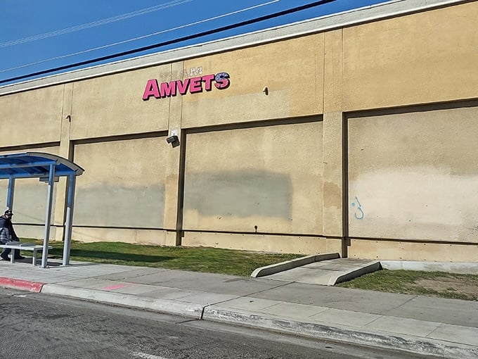 The unassuming beige exterior of AMVETS belies the treasure trove within—like finding a gourmet meal at a gas station, the best surprises come in modest packages.